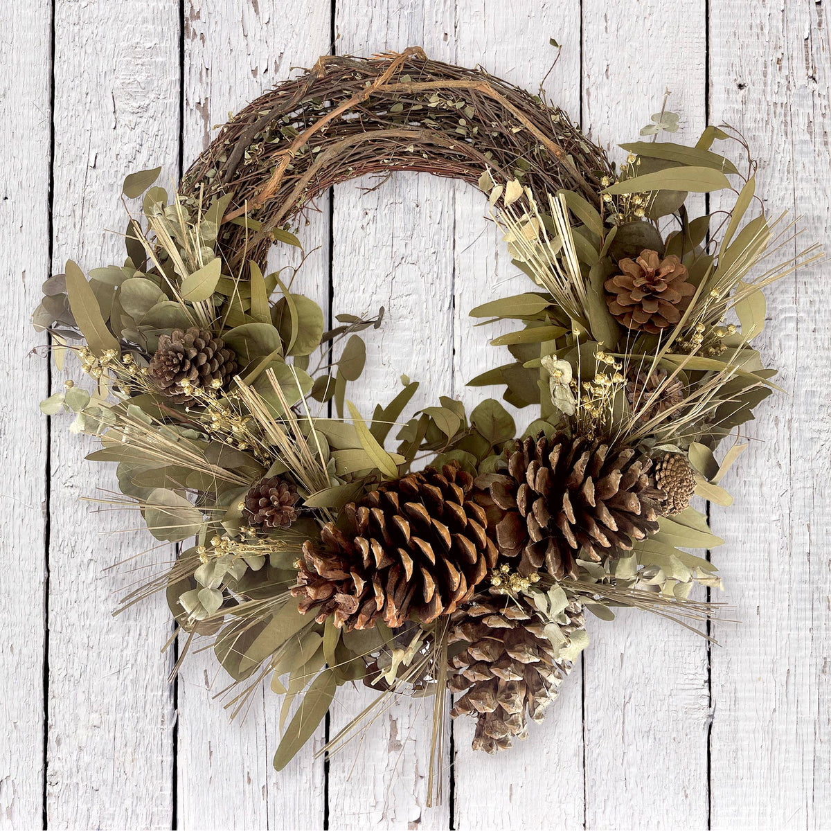 Woodland Pinecone Half Wreath – Paraíso Plant Studio